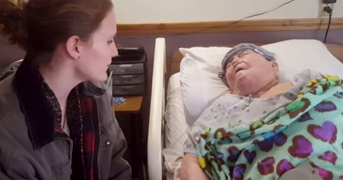 Caregiver sings hymn to an ailing patient
