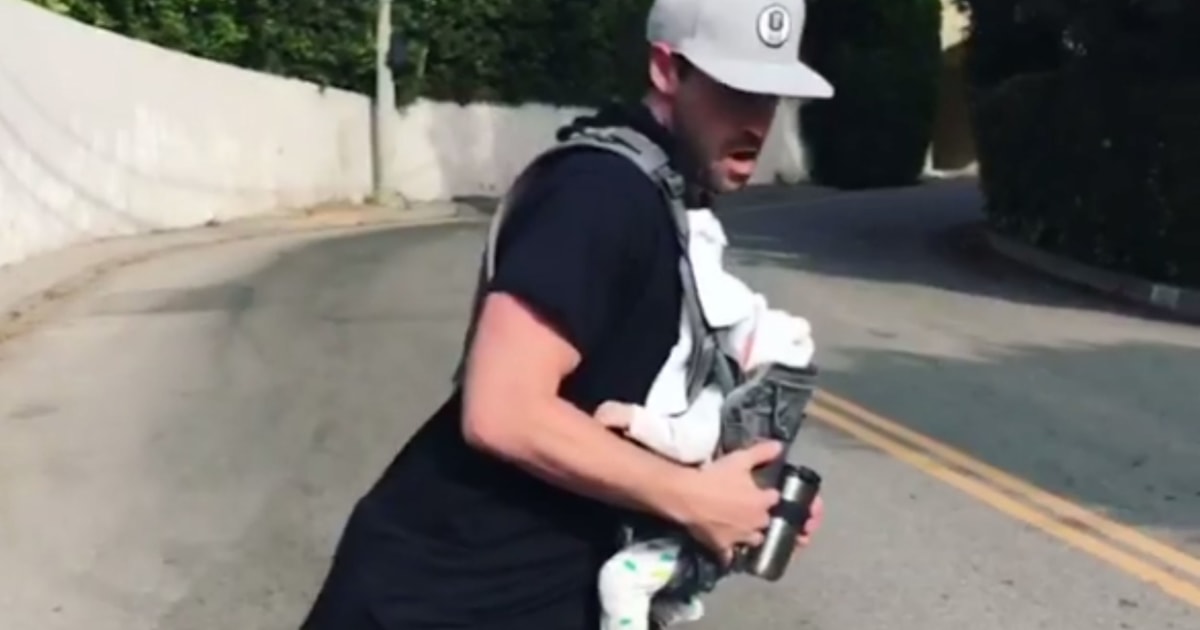 Maksim Chmerkovskiy dances in the street with infant son Shai in ...