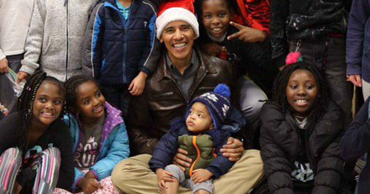 Barack Obama plays Santa Claus for a group of kids in Washington, D.C.