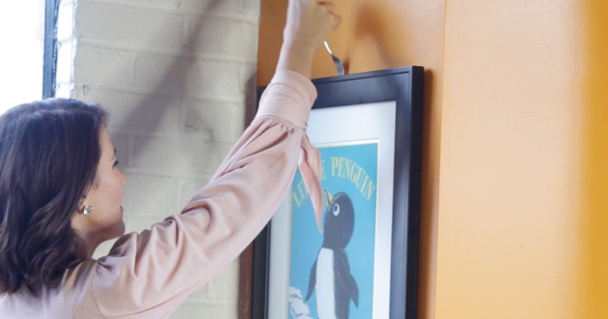 How to hang wall perfectly: Use a fork