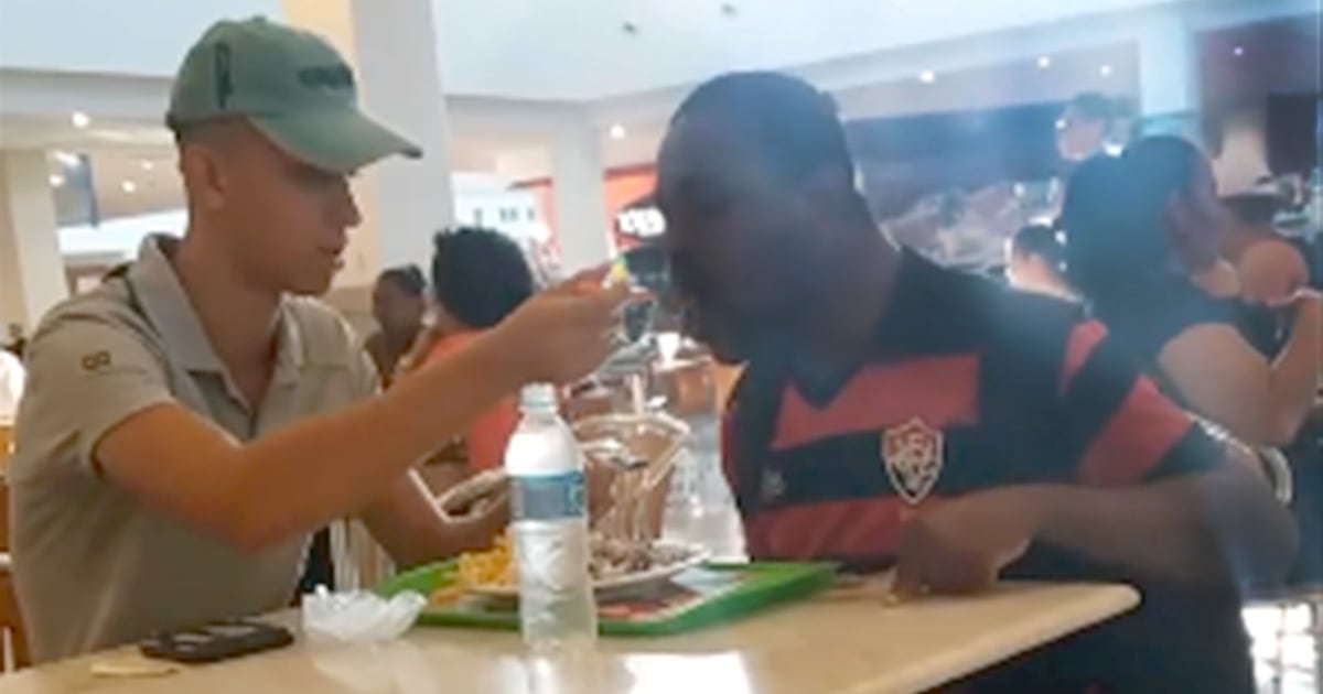 Fast-food employee feeds man with disability in moving video