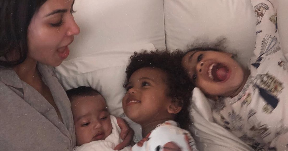 Kim Kardashian snuggles with baby Chicago, Saint and North in cute pic