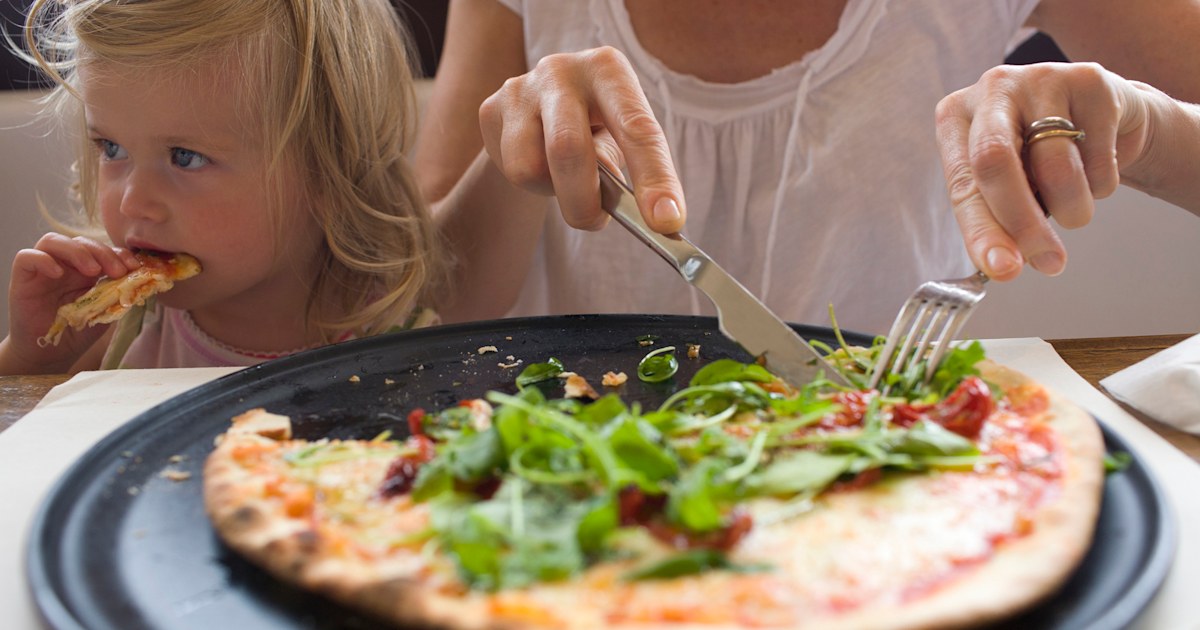 Pizza folding debate: expert shows the correct way to eat pizza