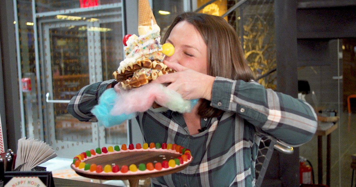 This giant ice cream-waffle tower is 2 feet tall