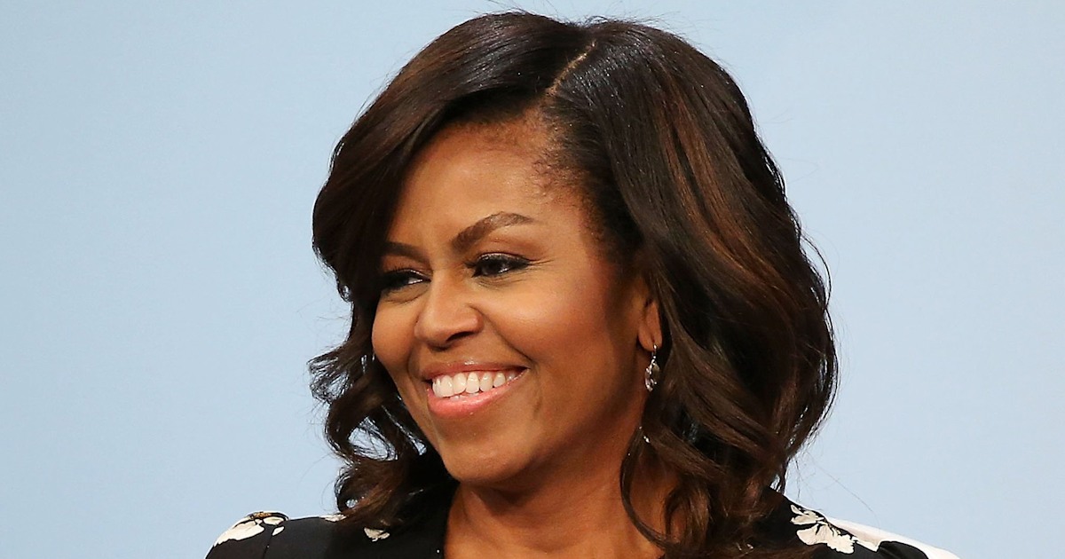 Michelle Obama wore her natural curly hair at Essence Festival