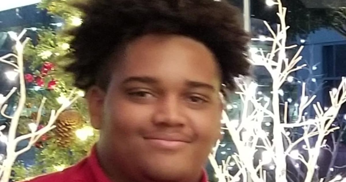 High school football player collapses and dies in twin brother's arms