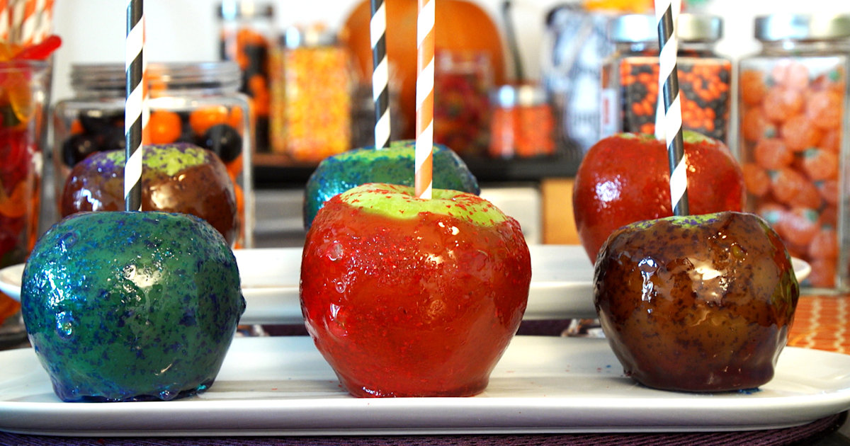 Make beautiful candy apples with edible glitter for a Halloween party