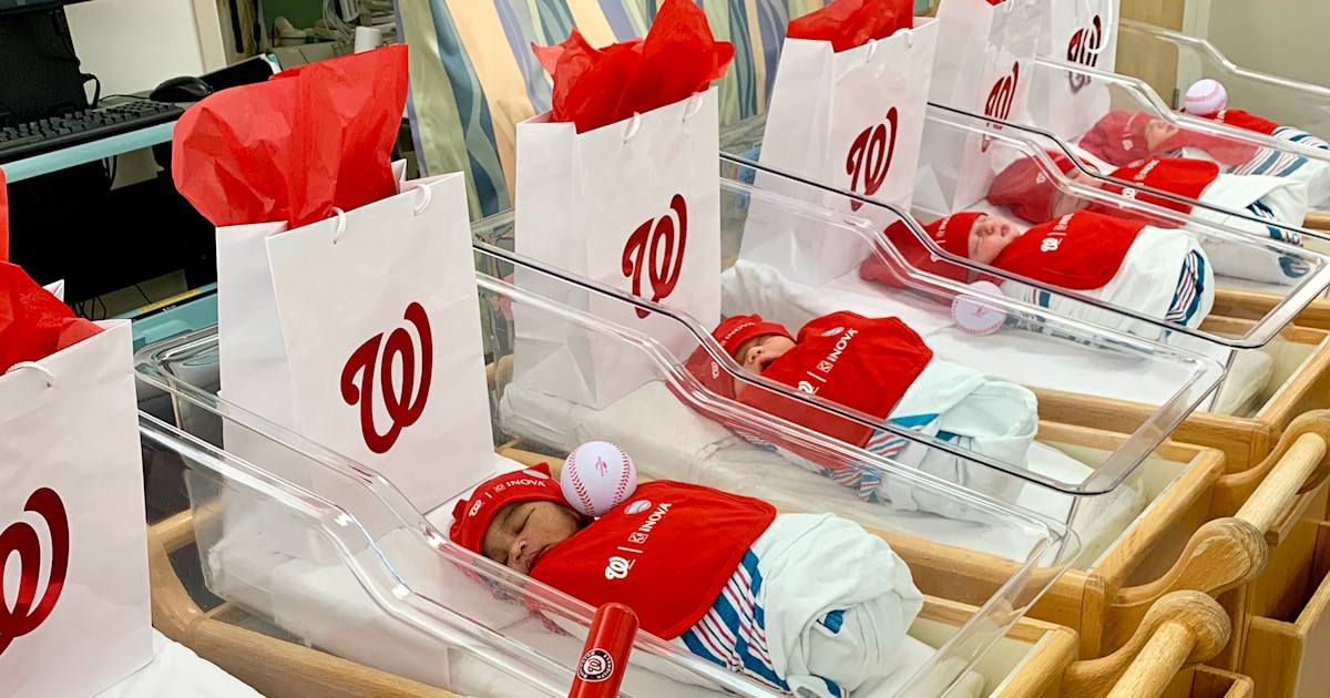 Newborns dress in Washington Nationals gear during World Series