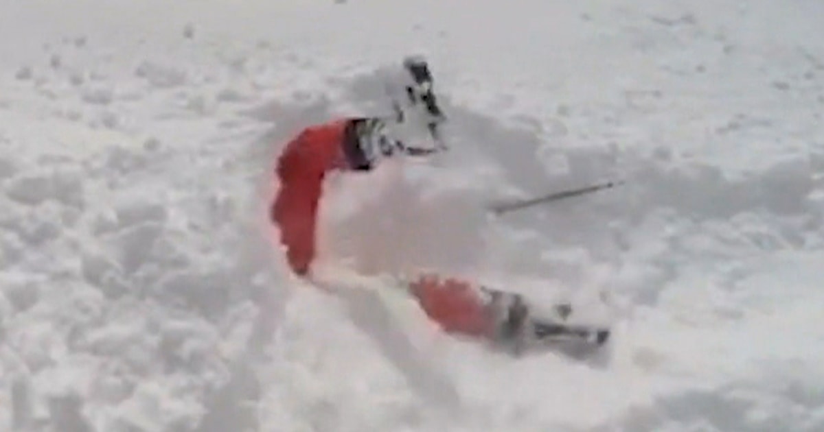 Stunning video shows rescue of skier trapped headfirst in snow in ...