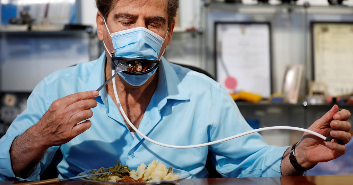 This high-tech face mask opens and closes with the touch of a button