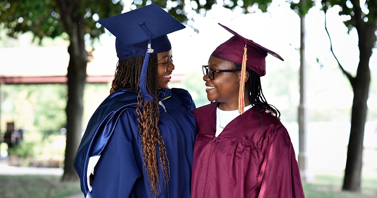 Mom, daughter graduate at same time, pose for cap and gown photos