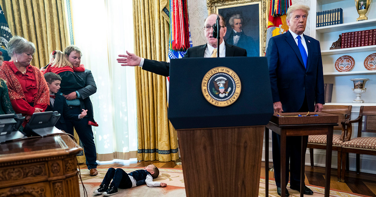 Dan Gable's grandson on Oval Office floor at Medal of Freedom ceremony