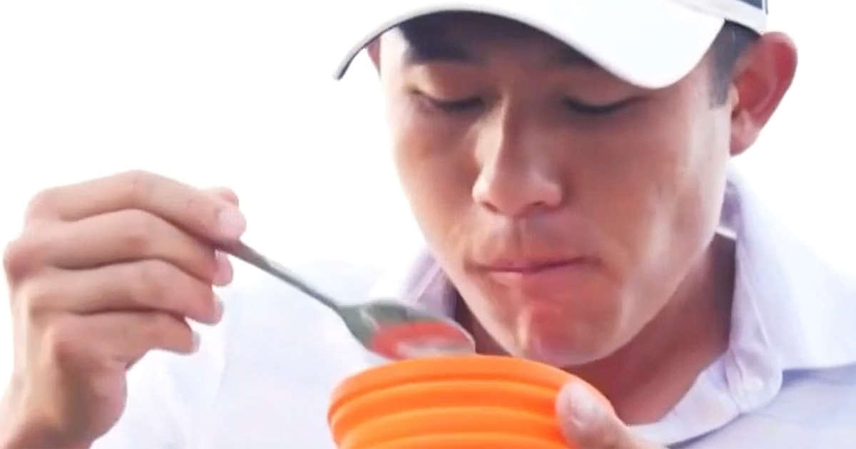 Collin Morikawa pours milk in bowl before cereal
