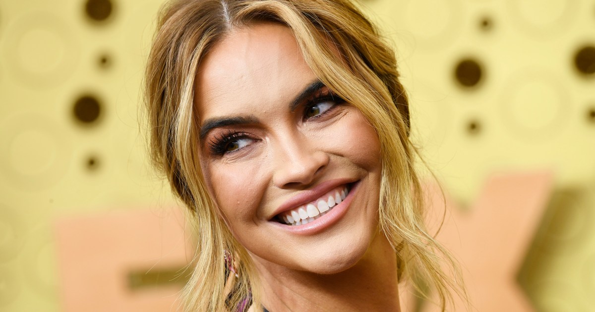 Chrishell Stause debuts dark hairstyle at People's Choice Awards