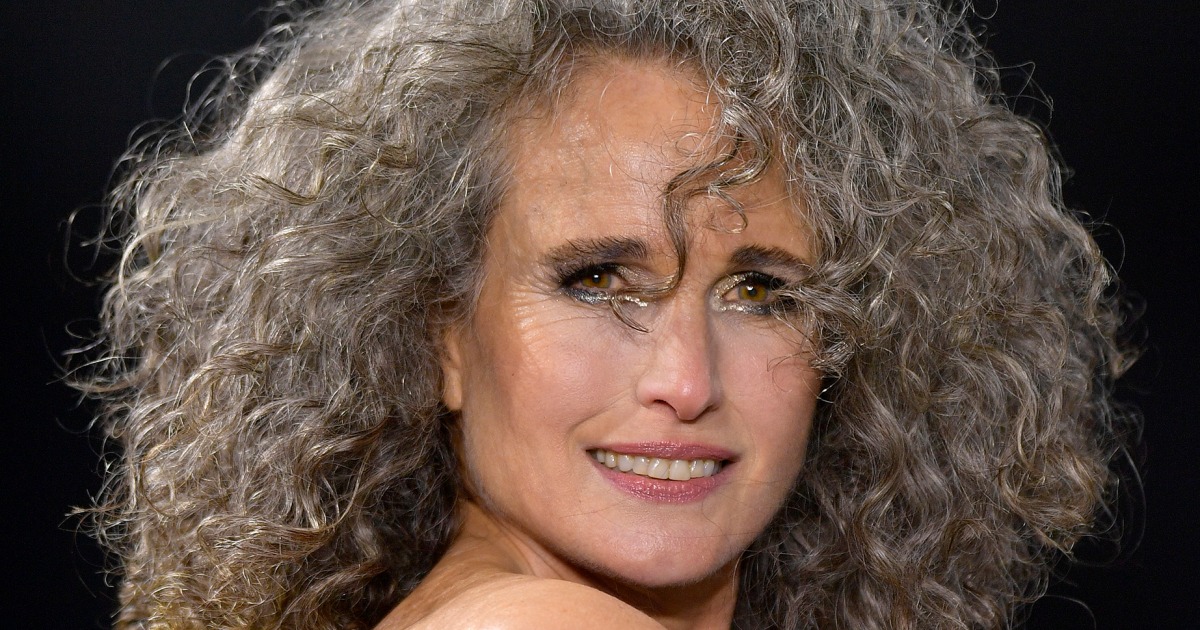 Andie MacDowell rocks gray curls and feathers on the runway at Paris ...