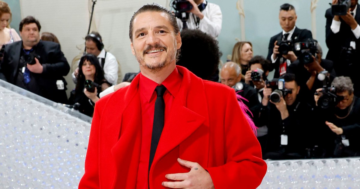 Pedro Pascal is often seen putting his hand on his chest in photos ...