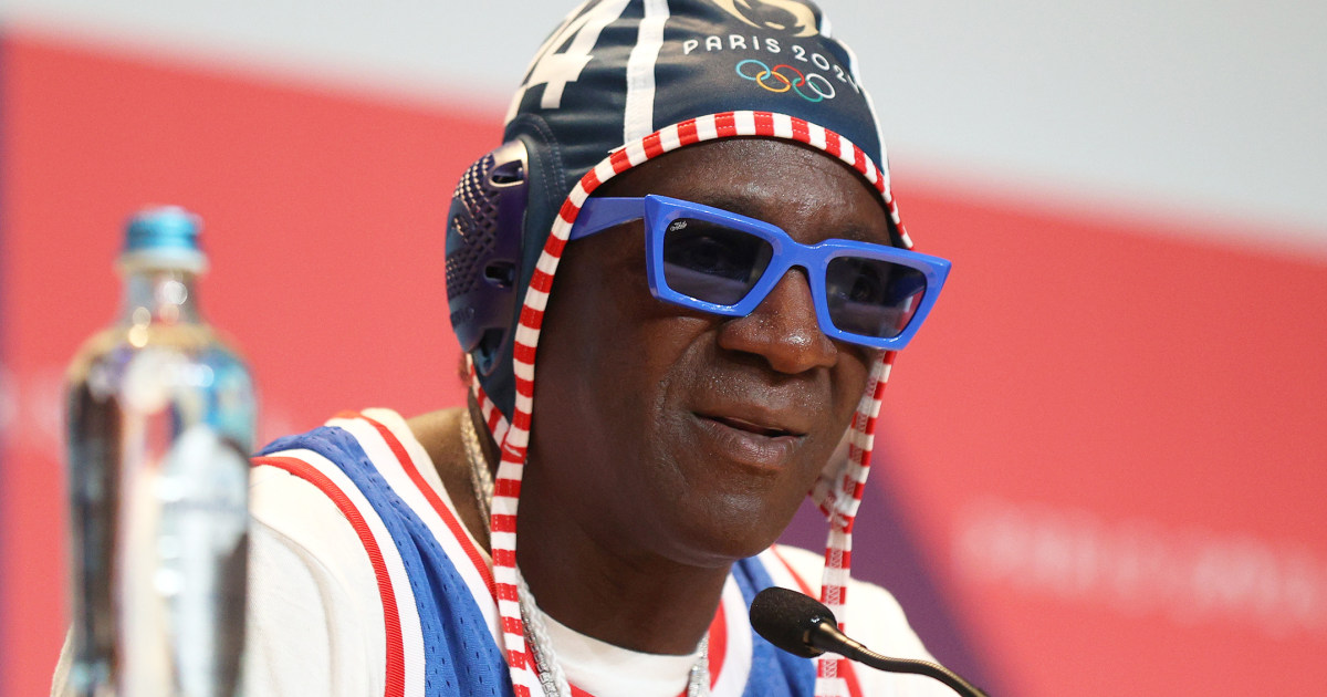Flavor Flav Wears Clock From Water Polo Star's Late Sister-In-Law