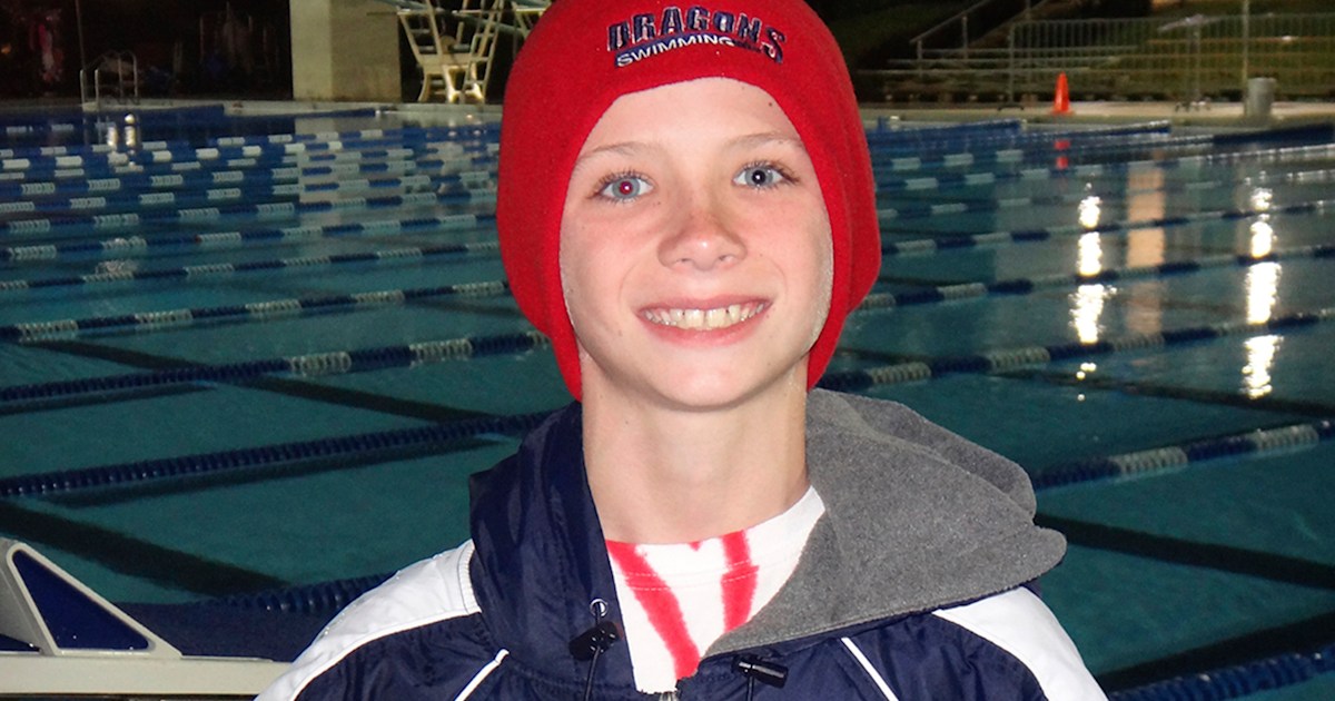 Swimming champ, 9, gives trophy to hospitalized rival