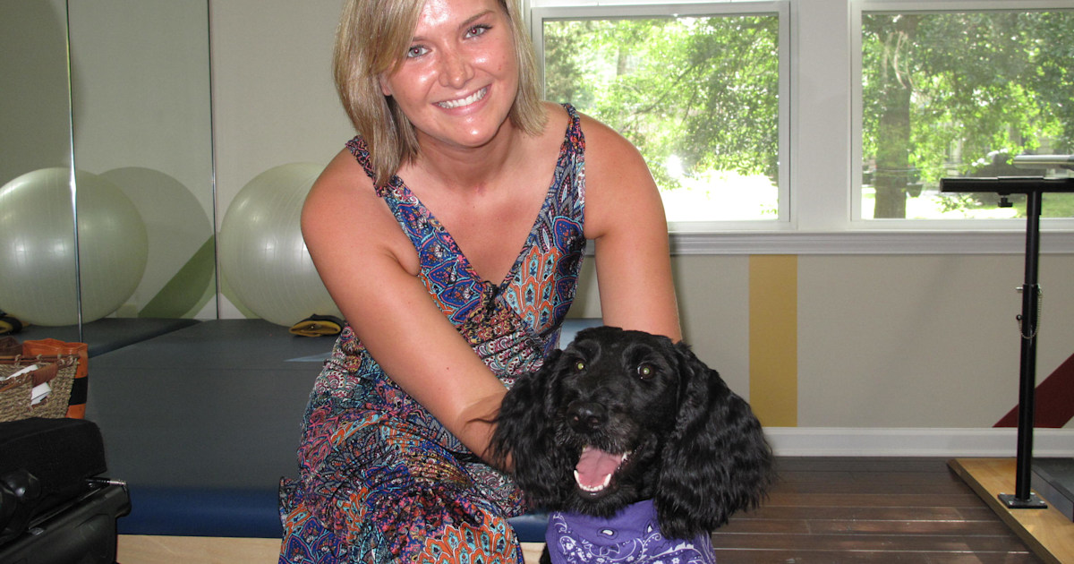 Aimee Copeland gets a service labradoodle